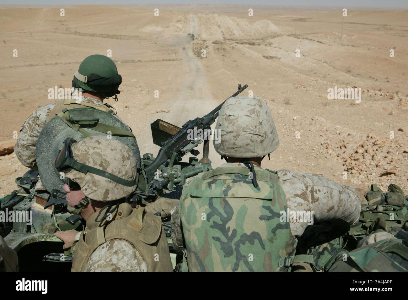 Jul 01, 2004; Al Qaim, Iraq; Marines with 1st Light Armored ...