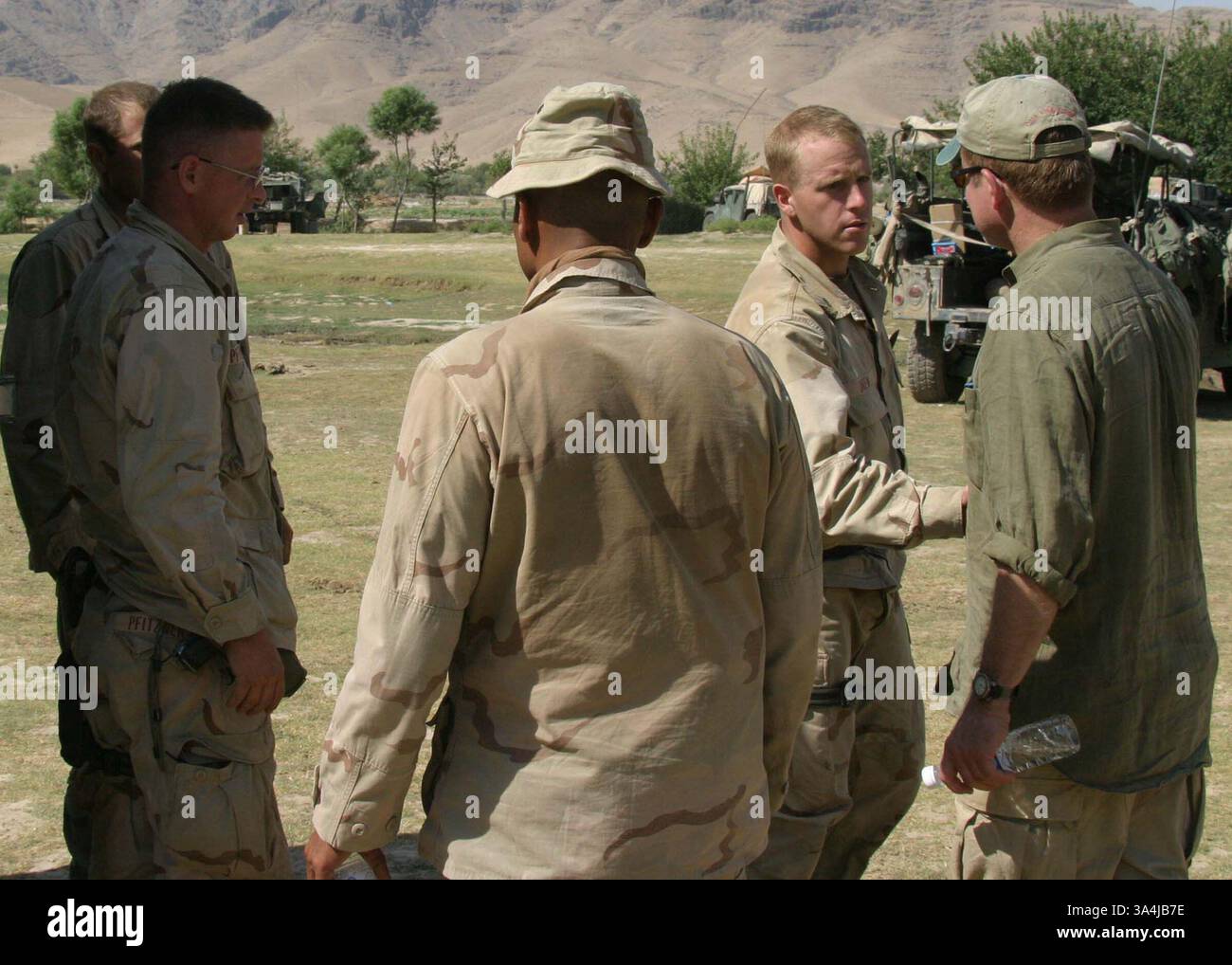 Jul 04, 2004; FOB Ripley, Afghanistan; JAMES WEBB, far right, a writer ...