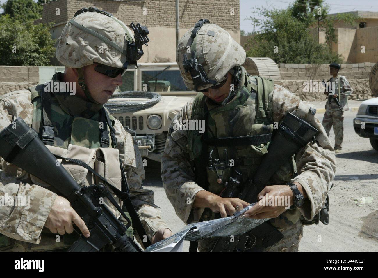 Jul 27, 2004; Al Kharma, Iraq; Cpl. TIMOTHY R. PEREA, a mortarman with ...