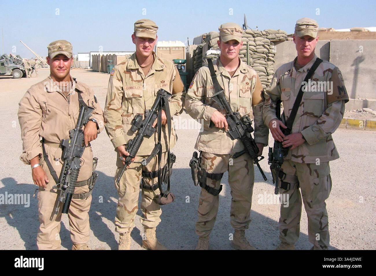 Aug 11, 2004; FOB Kalsu, Iraq; (left to right) Army Sgt. DOMENIC ...