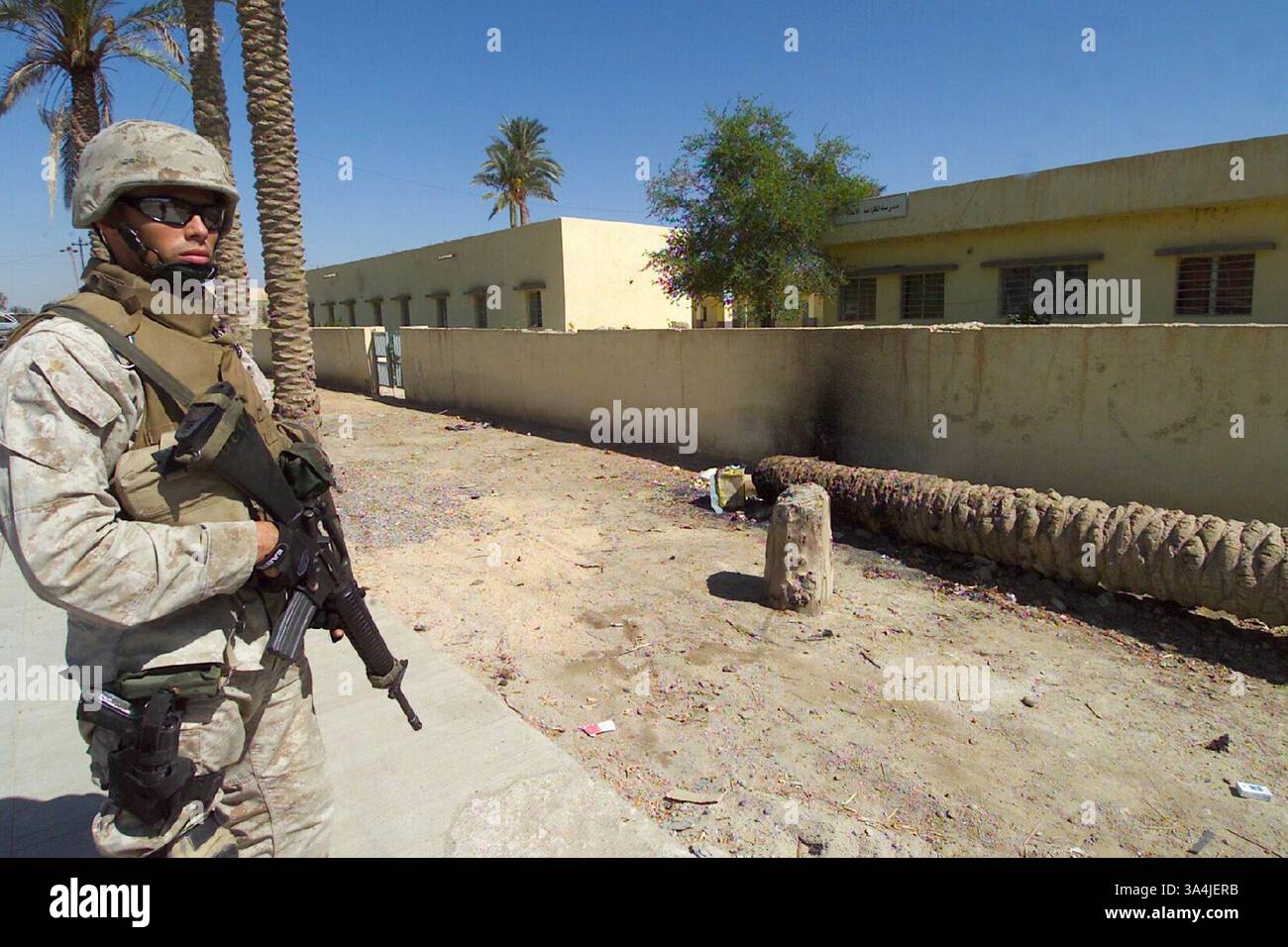 Aug 15, 2004; Jurf as Sakhr, Iraq; A Marine from the 3rd Civil Affairs ...
