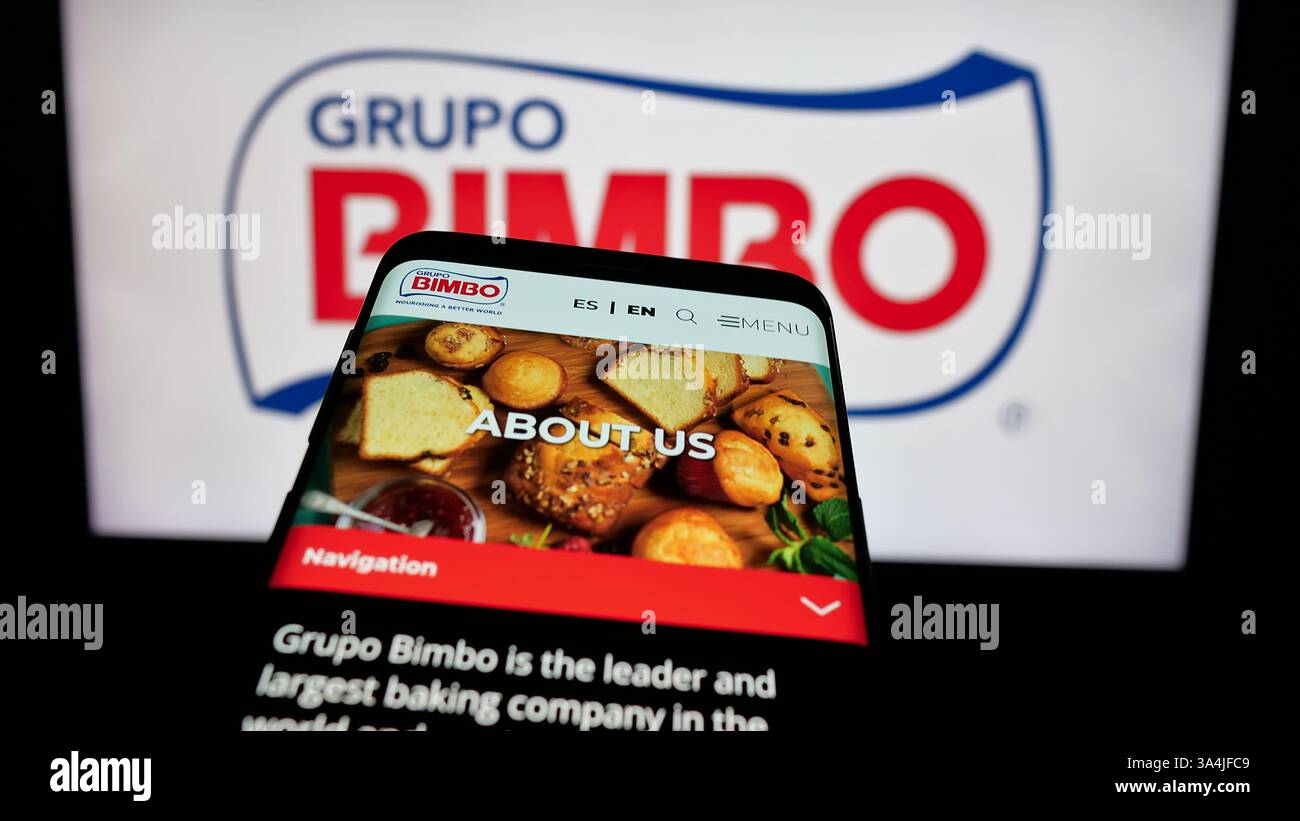 In this photo illustration, a smartphone with the website of Mexican food company Grupo Bimbo S ...