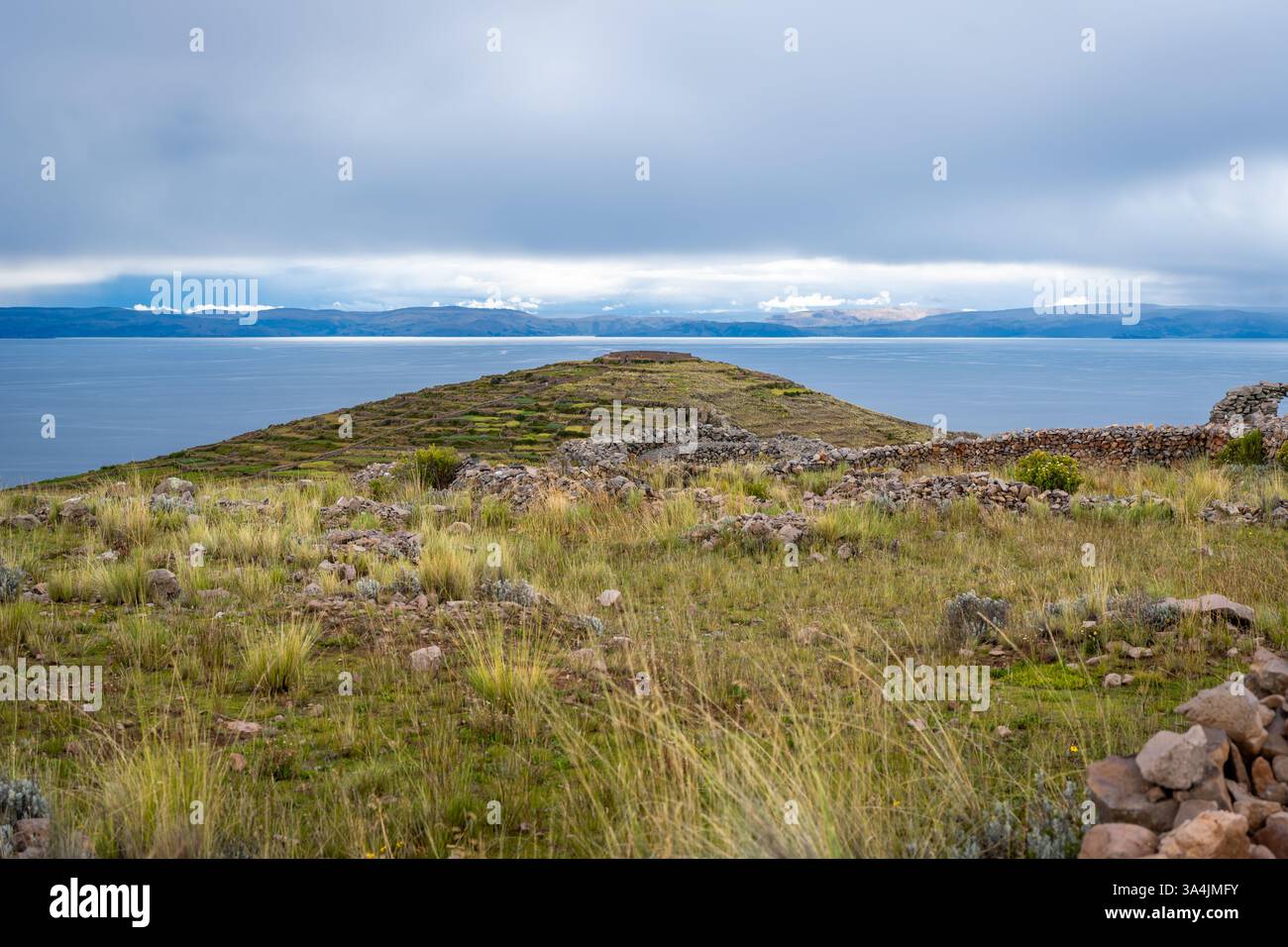 The sacred mountain of Pachatata on Amantani Island, Peru, features ...