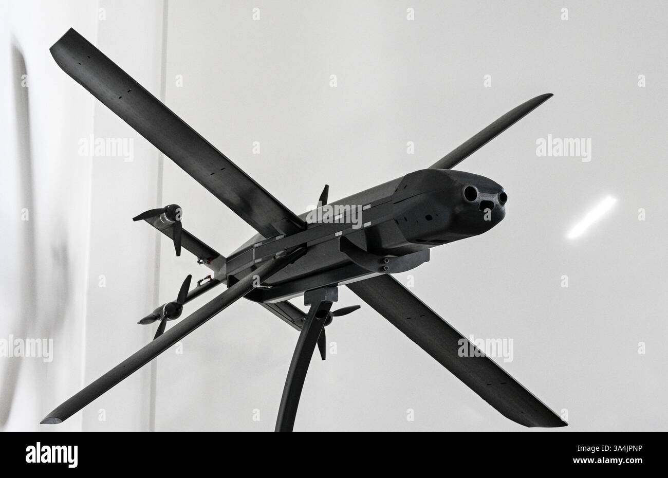 Berlin, Germany. 18th Mar, 2025. The model of an HX-2 drone is on ...