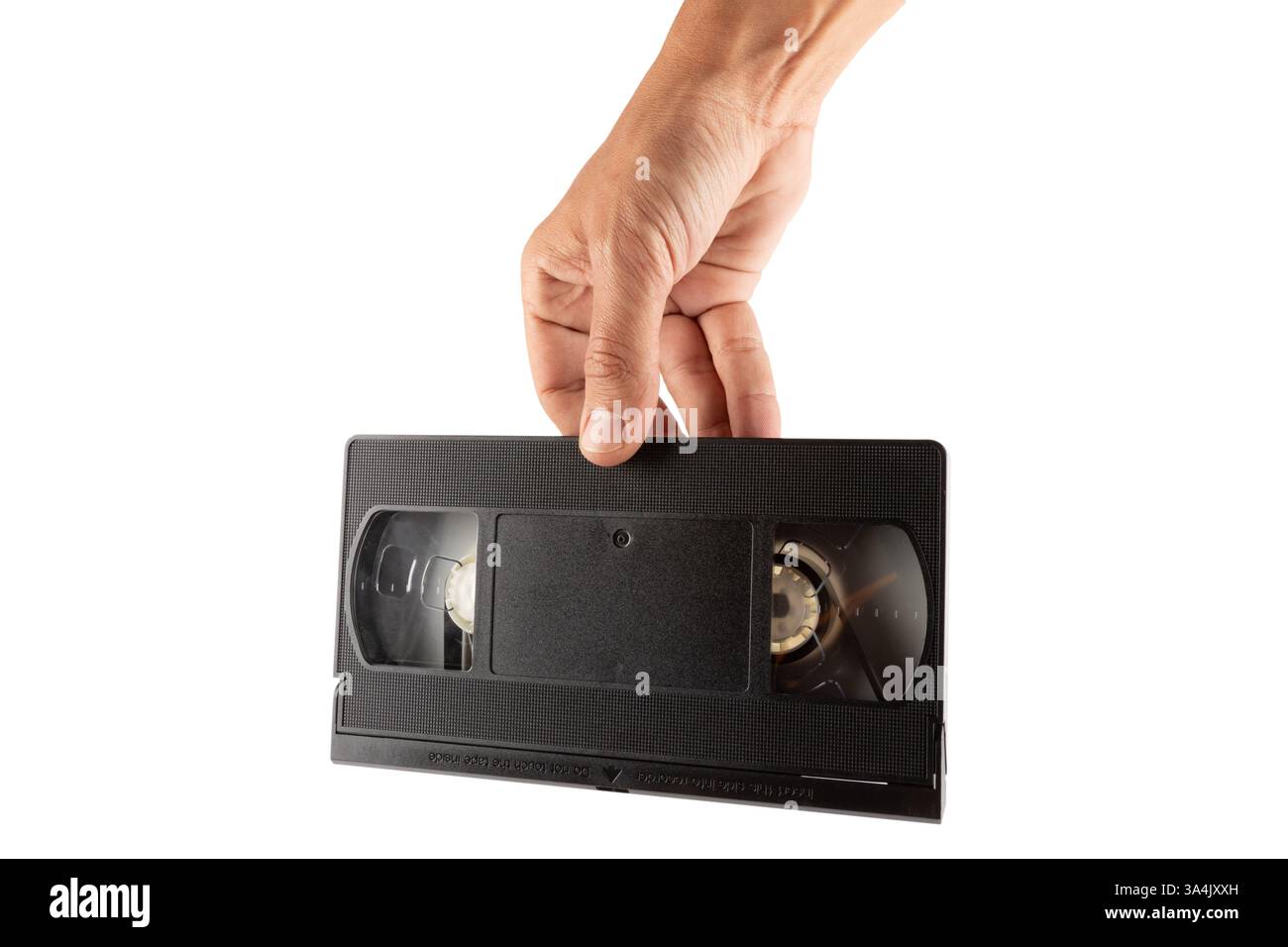 Male hand holding an VHS tape isolated no background cutout Stock Photo ...