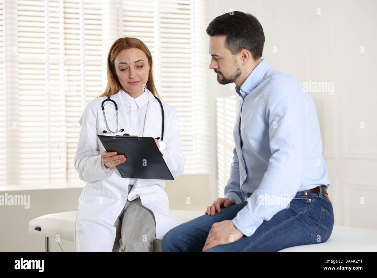 Man having appointment with cardiologist in clinic Stock Photo - Alamy