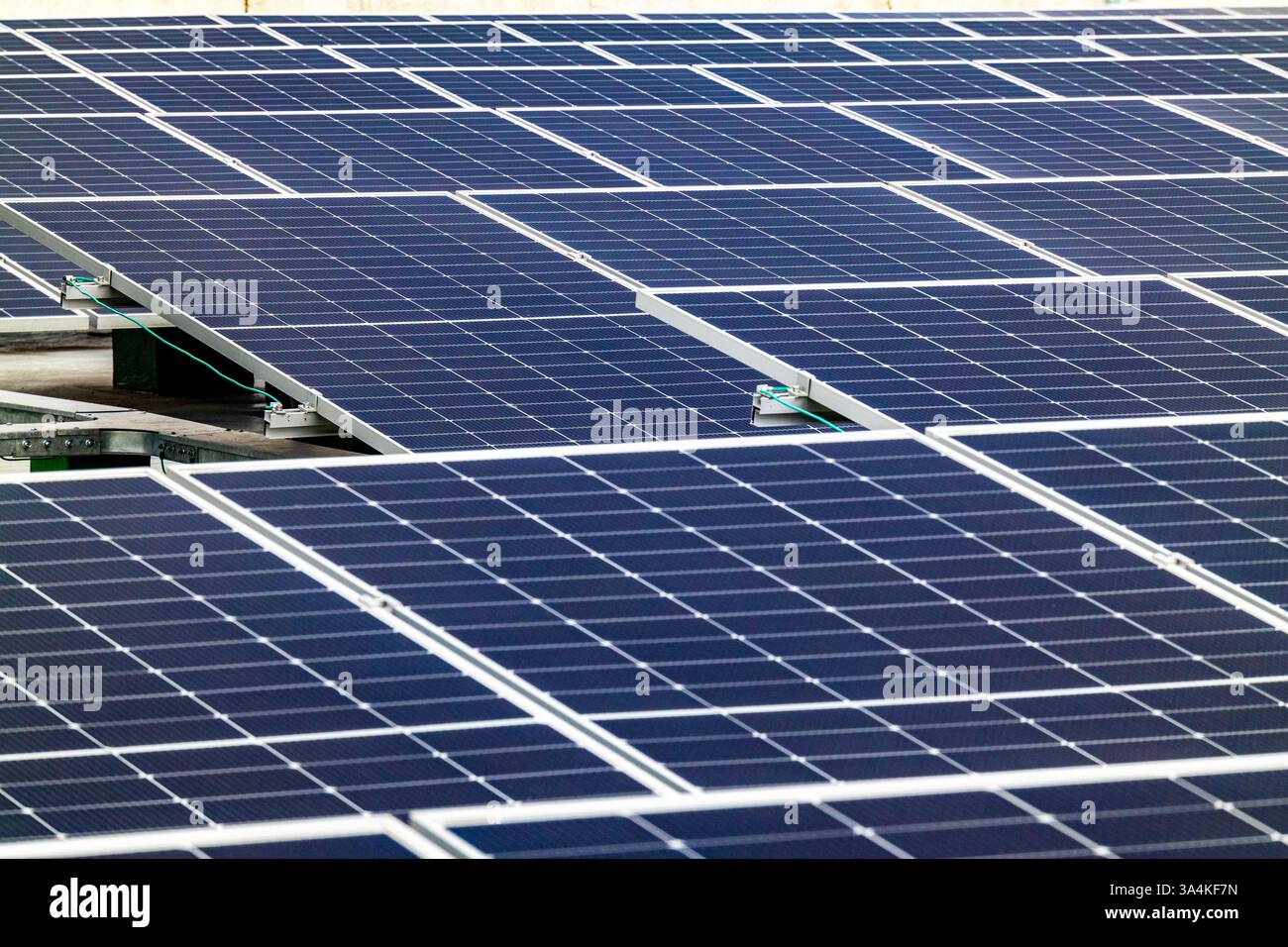 Solar Panel Photovoltaic installation on a Roof of factory, alternative ...