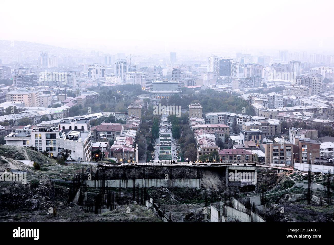 Misty view of Yerevan city from a high vantage point, showcasing a ...
