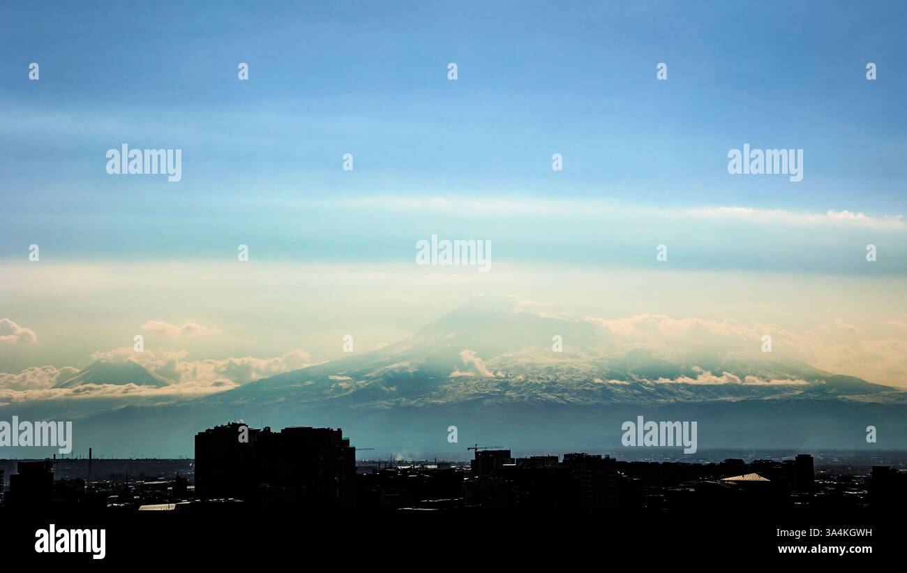A breathtaking view of Mount Ararat covered in snow, framed by soft ...