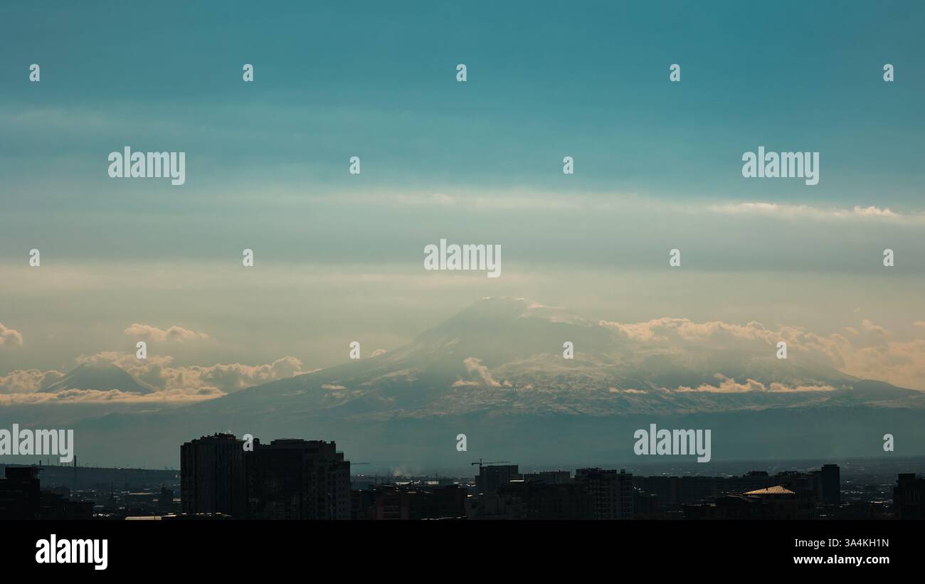 A breathtaking view of Mount Ararat covered in snow, framed by soft ...
