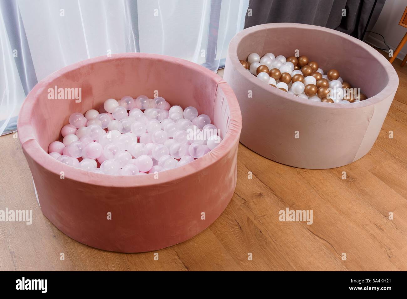 Two Round Pastel-Pink Play Ball Pits Filled With Soft White, Pink, and ...