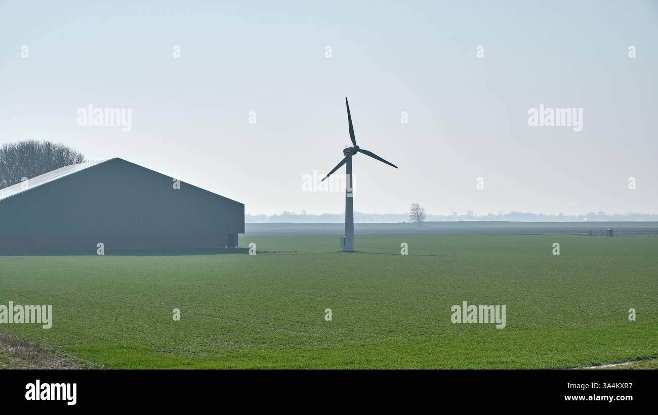 March 10, 2025 - Groningen-Netherlands: A small wind turbine stands ...