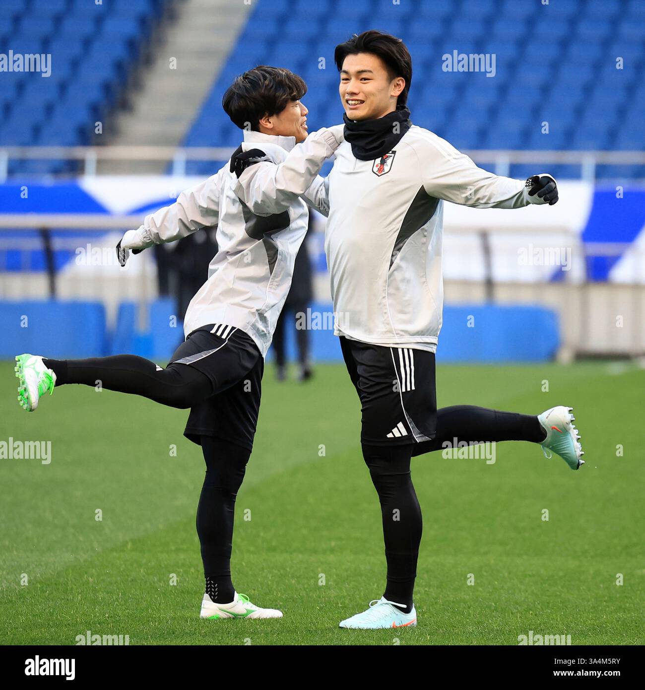 Ayase Ueda (R), a member of Japanese national football team, attends an ...