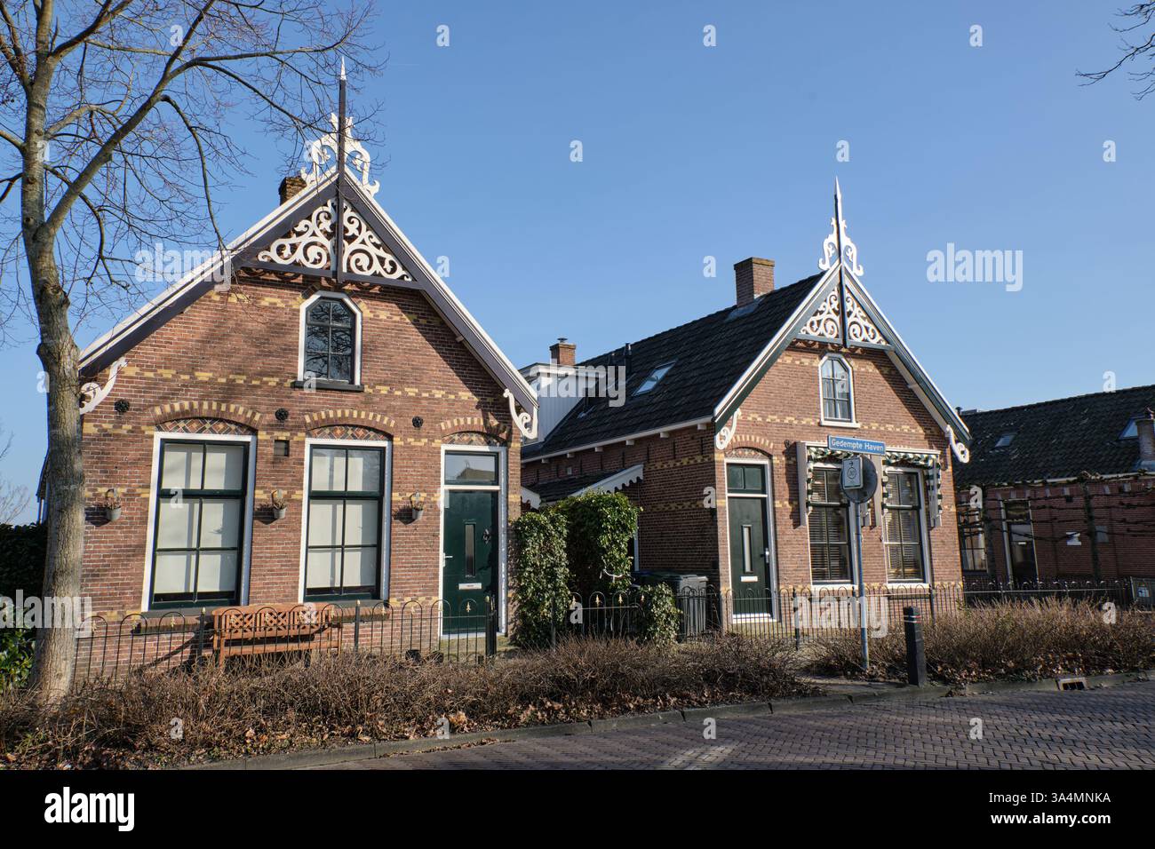 March 10, 2025 - Grou, Netherlands: A row of early 20th-century workers ...