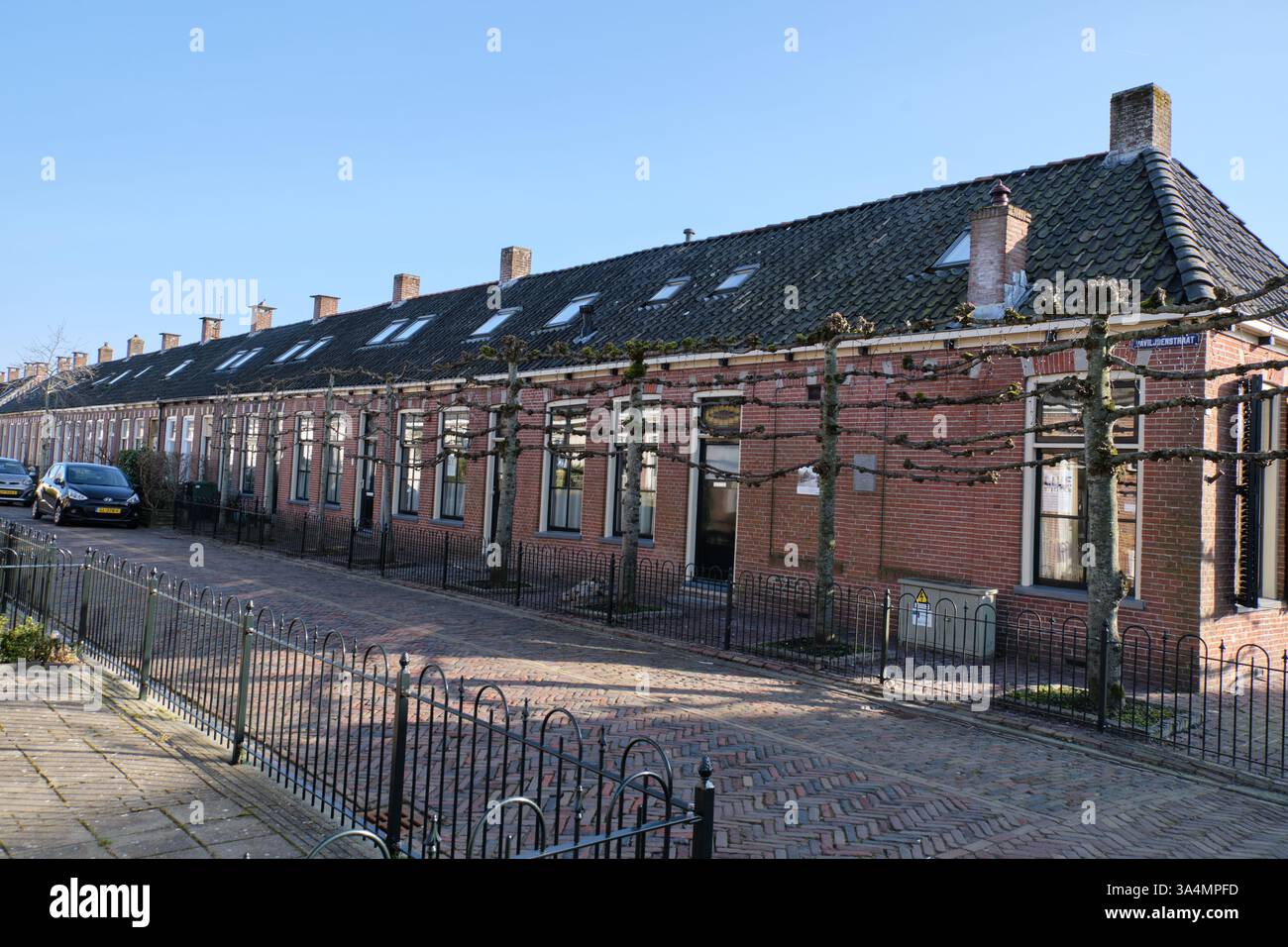 March 10, 2025 - Grou, Netherlands: A row of early 20th-century workers ...
