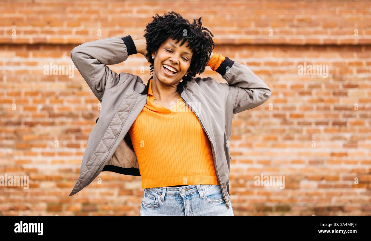 Woman vibrant orange hair african hi-res stock photography and images ...