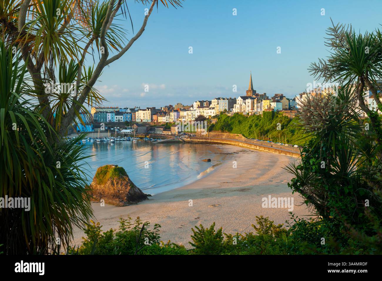 Sunrise on North Beach in Tenby Stock Photo - Alamy