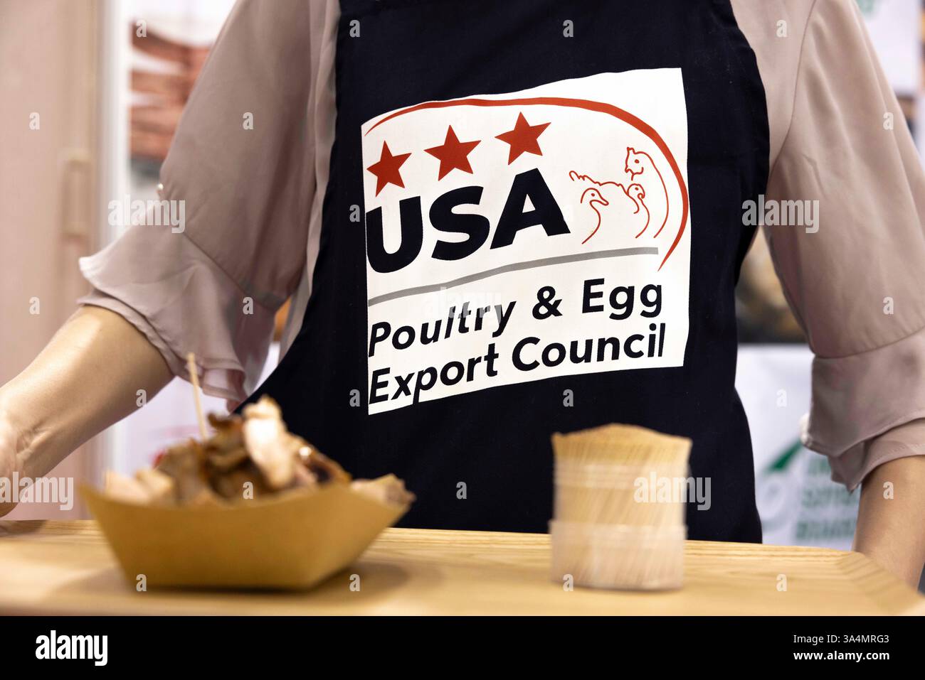 Grilled chicken is being offered inside the USA exhibition pavilion at ...