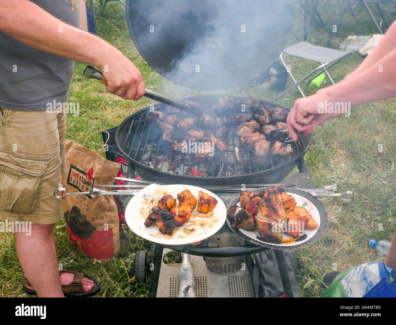 Grilling meat on special hi-res stock photography and images - Alamy