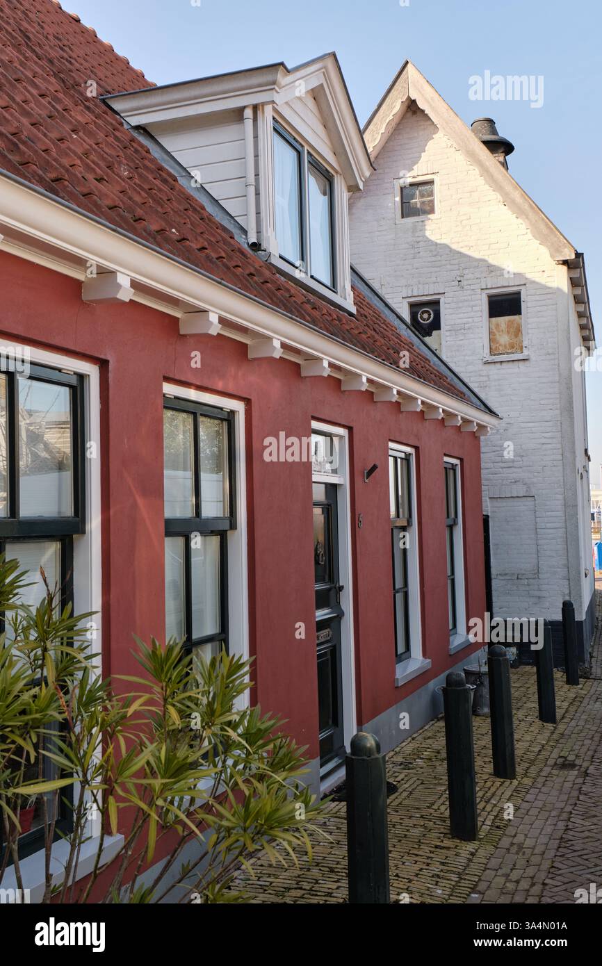 March 10, 2025 - Grou, Netherlands: A charming narrow street lined with ...