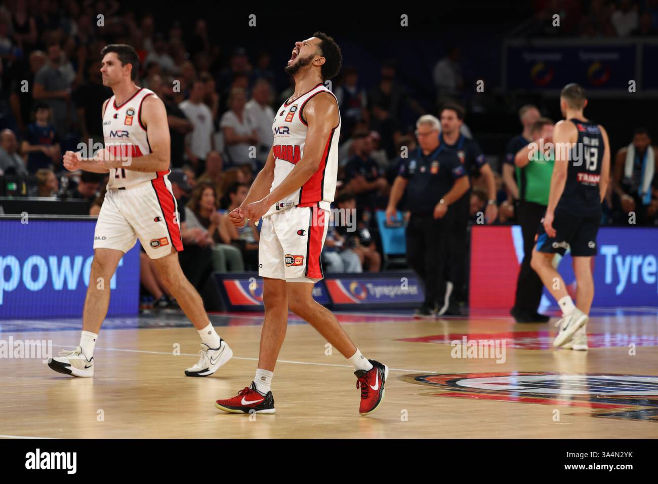 Tyler Harvey of the Illawarra Hawks celebrates on the final buzzer ...