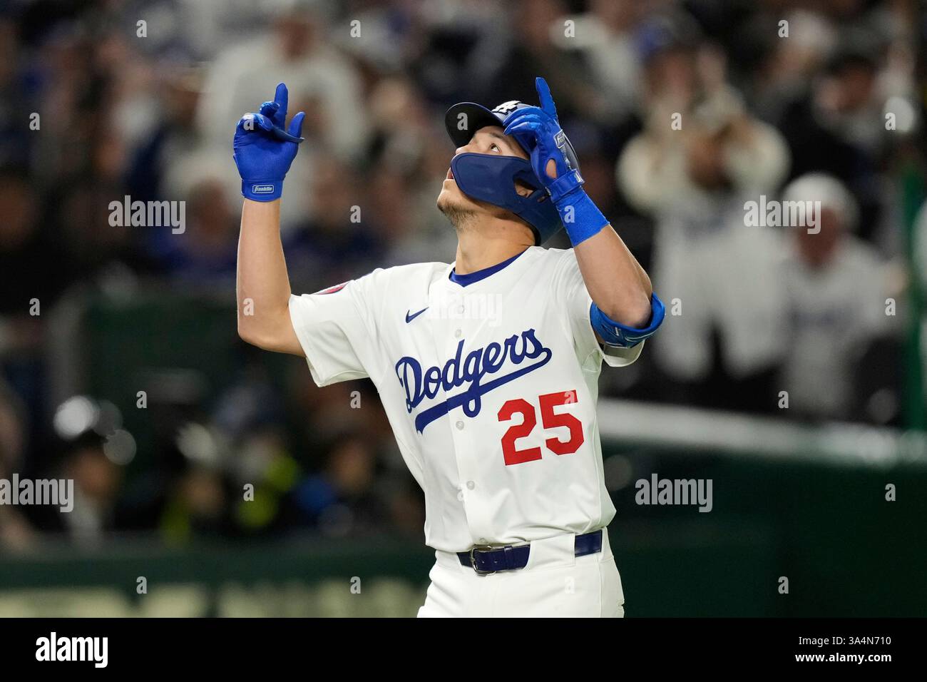 Los Angeles Dodgers second baseman Tommy Edman celebrates after hitting ...