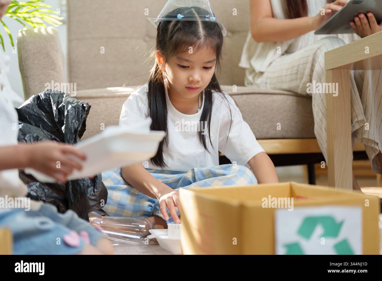 Sustainable Crafts and Environmental Education. Children learning to recycle materials ...