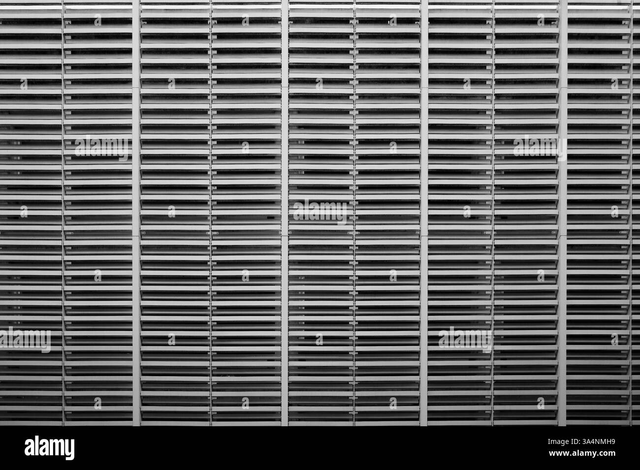 A black and white image showcasing a tightly cropped, symmetrical view ...