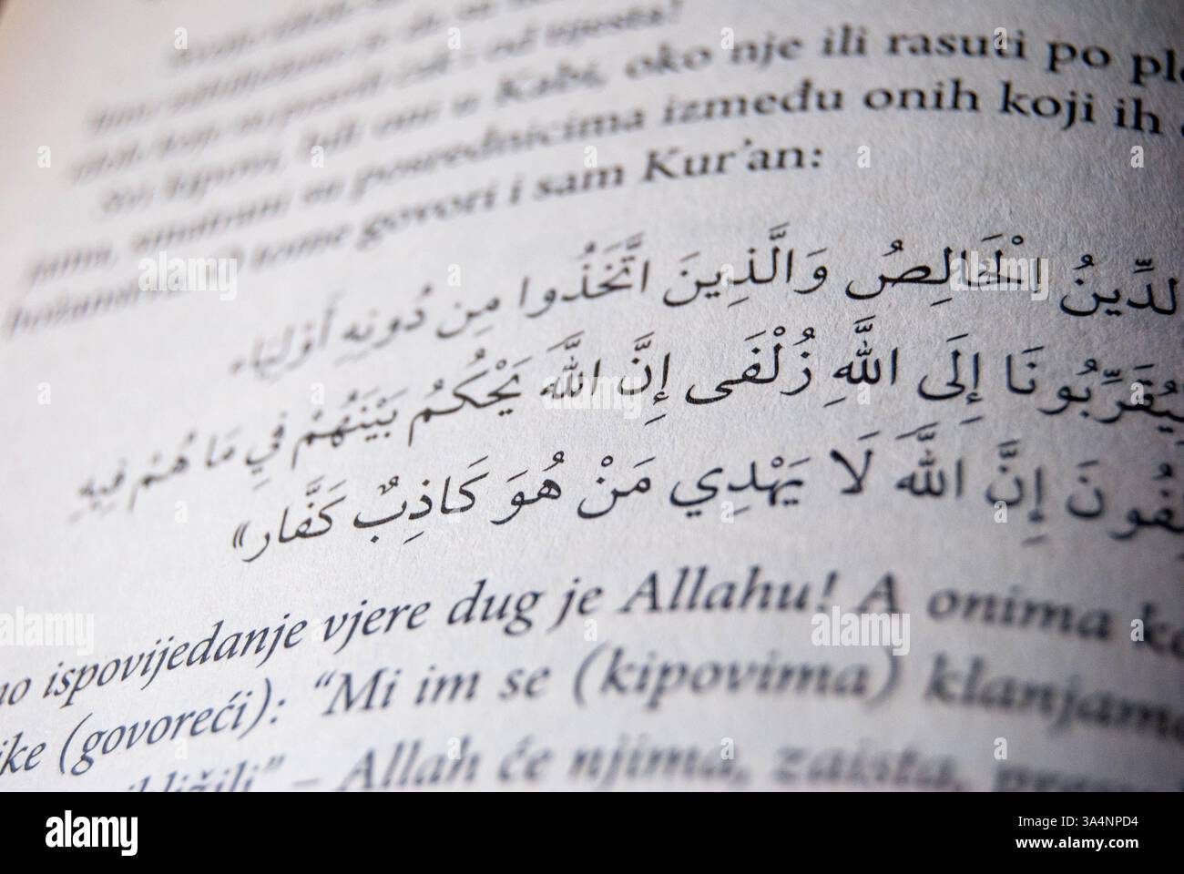 Close-up photo of Arabic text on aged book pages, showcasing intricate ...