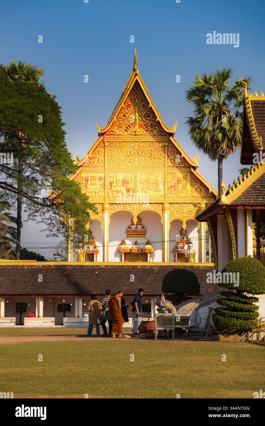 A beautiful Buddhist temple in Laos, featuring traditional architecture and a serene atmosphere ...