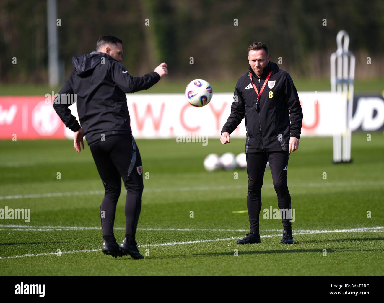 Wales manager Craig Bellamy (right) during a training session at FAW HQ ...
