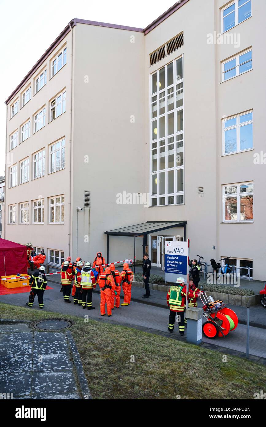 19 March 2025, Schleswig-Holstein, Kiel: Firefighters in protective ...