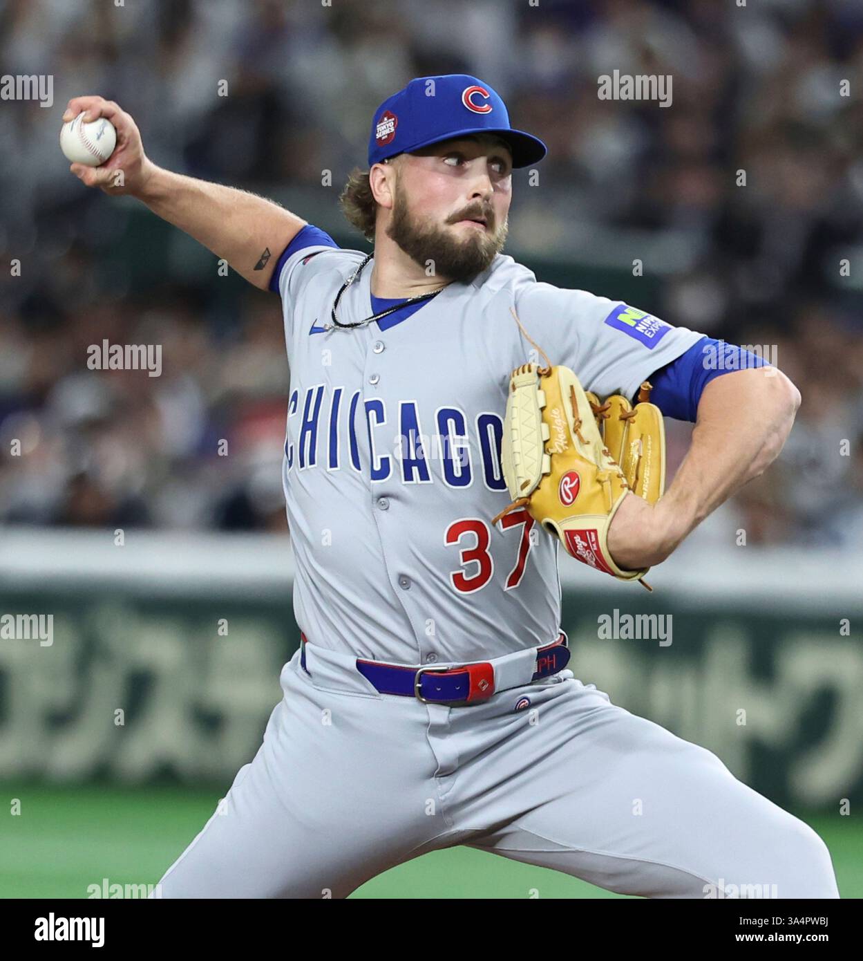 Porter Hodge of Chicago Cubs throws a ball during the MLB Tokyo Series ...