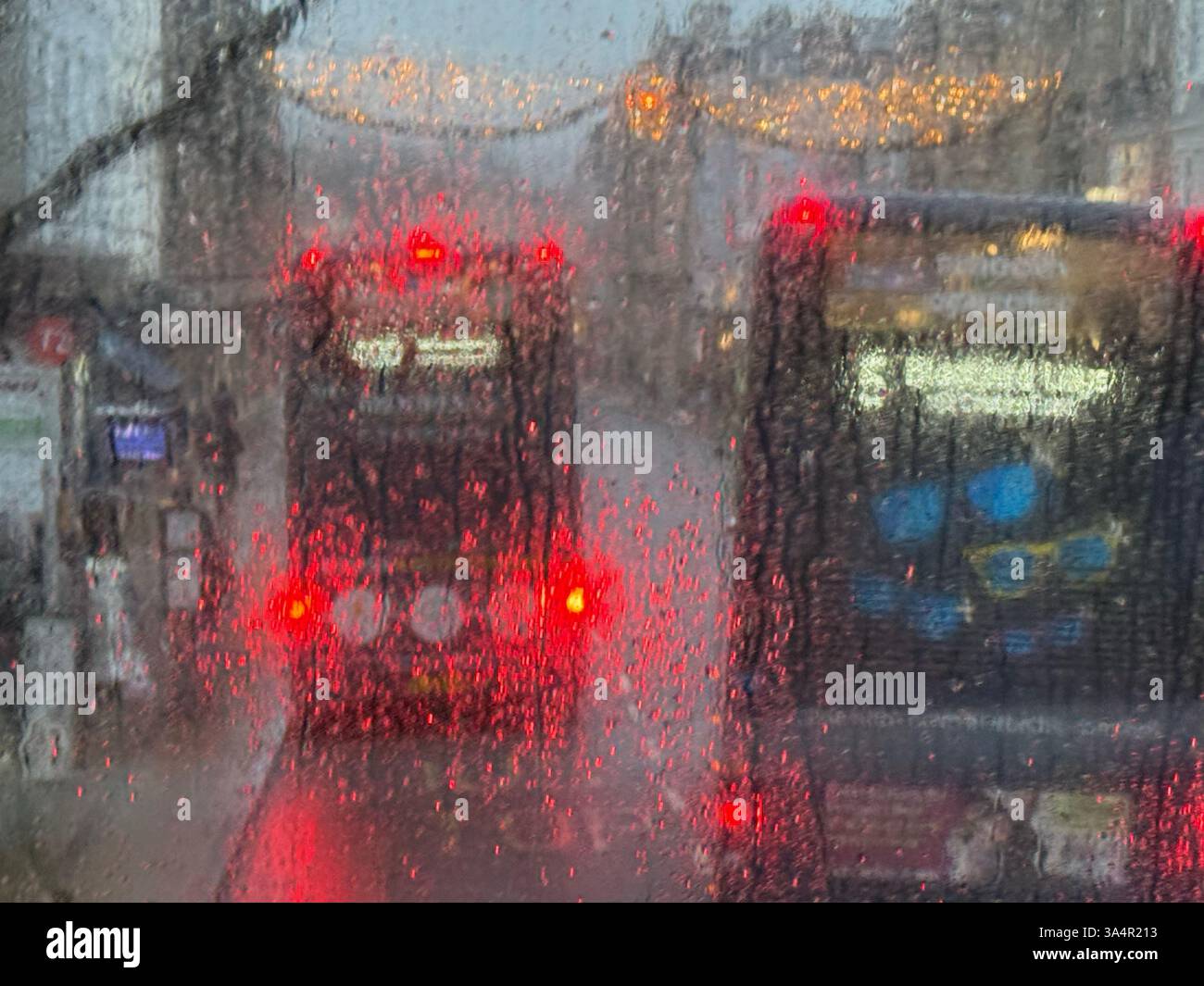 Wet light. Distortion by refraction through raindrops Stock Photo - Alamy