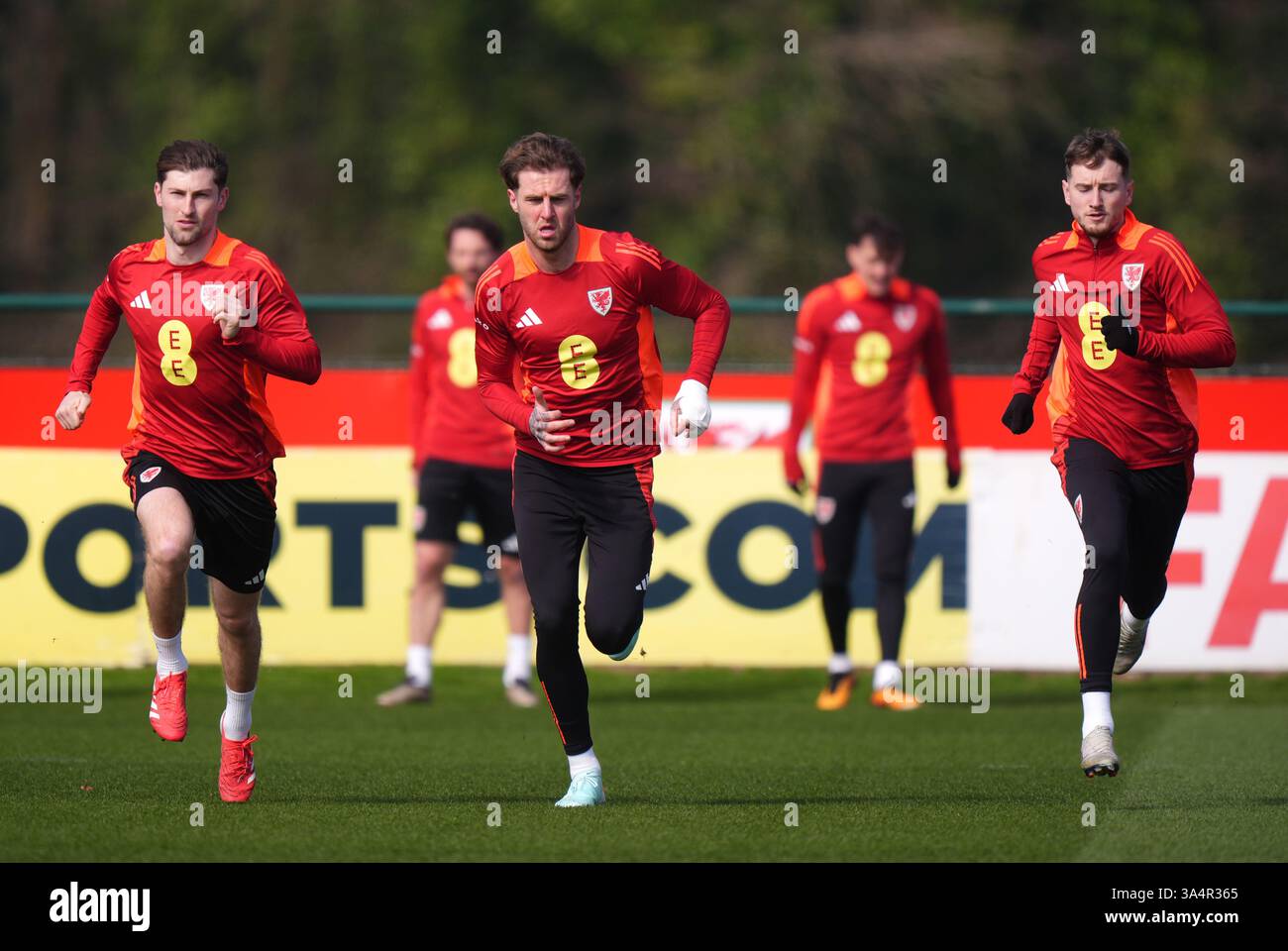 Wales' Ben Davies, Joe Rodon and David Brooks during a training session ...