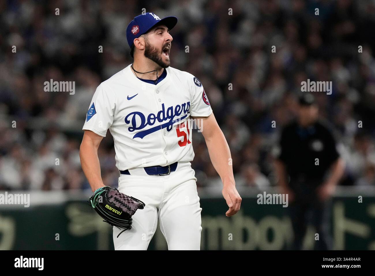 Los Angeles Dodgers relief pitcher Alex Vesia celebrates after striking ...