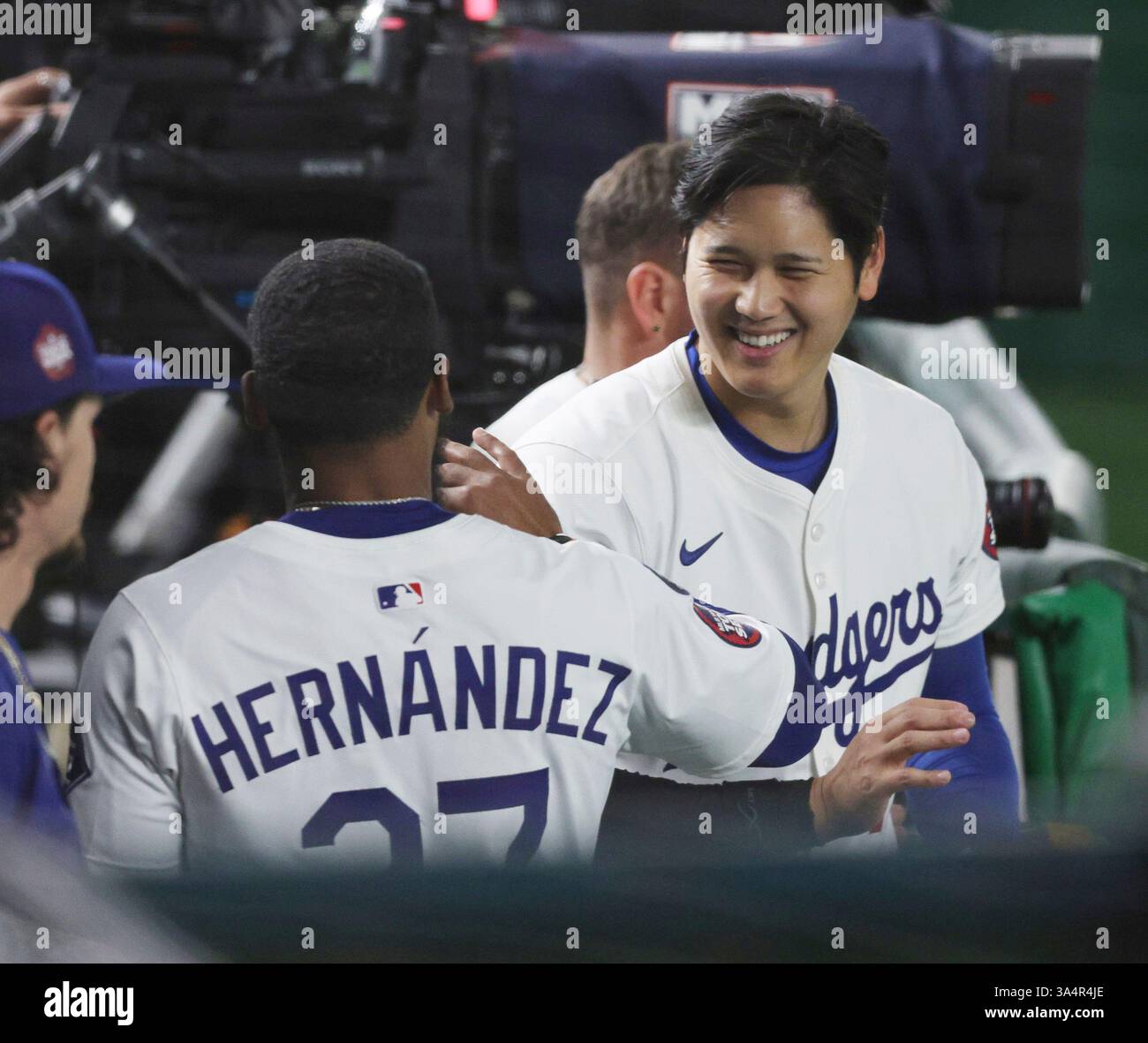 Los Angeles Dodgers Shohei Ohtani smiles after the seventh inning of ...