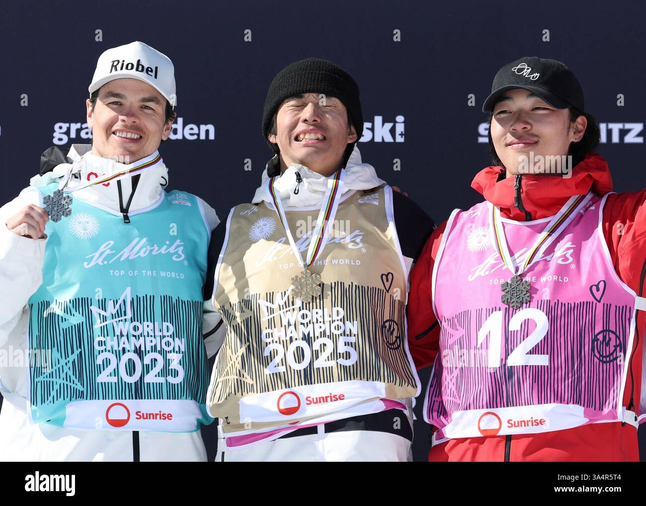 Ikuma Horishima of Japan (C) celebrates during an award ceremony of men ...