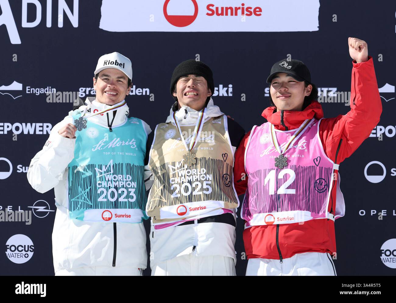 Ikuma Horishima of Japan (C) celebrates during an award ceremony of men ...