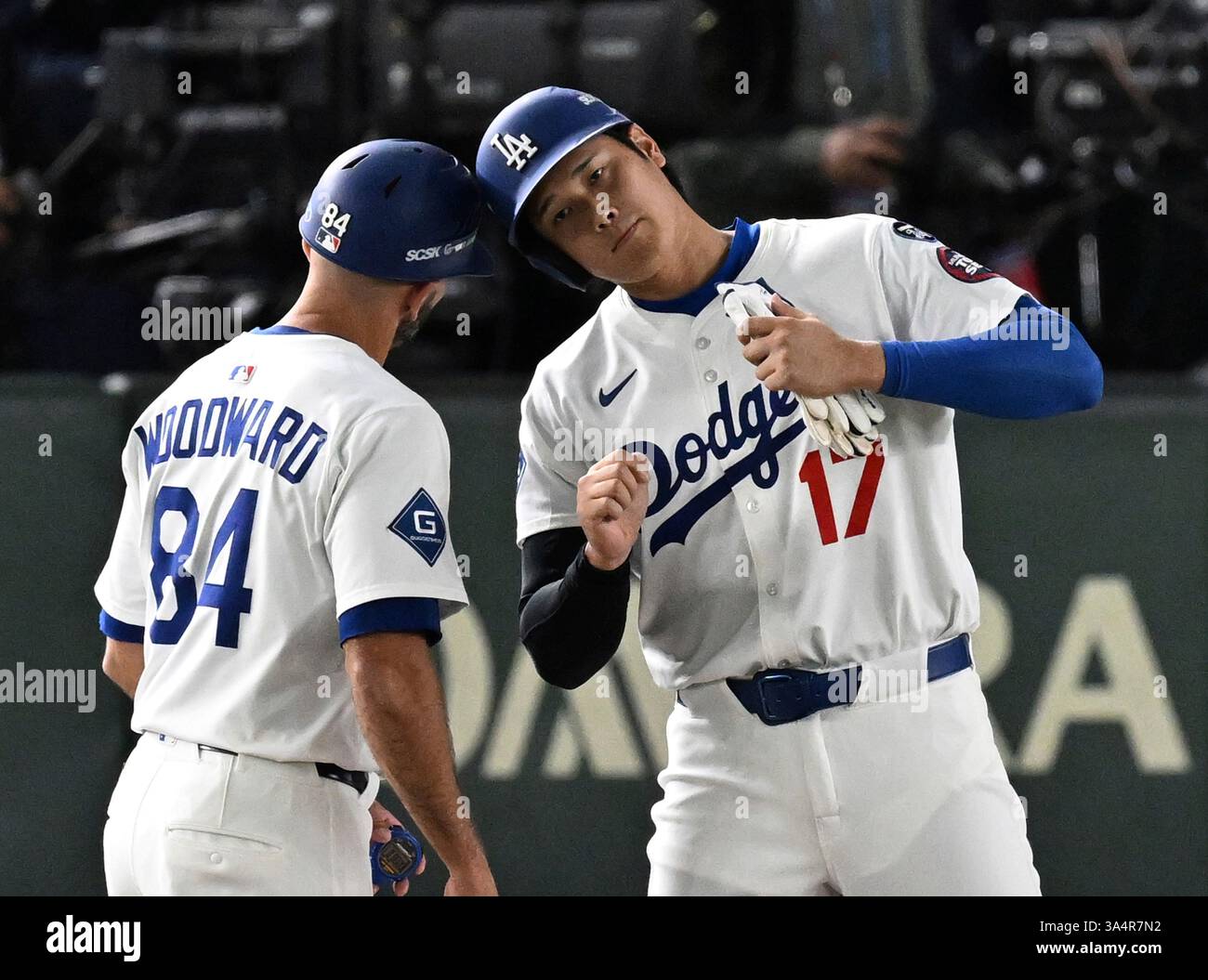 Los Angeles Dodgers Shohei Ohtani (R) gets on base due to an ...