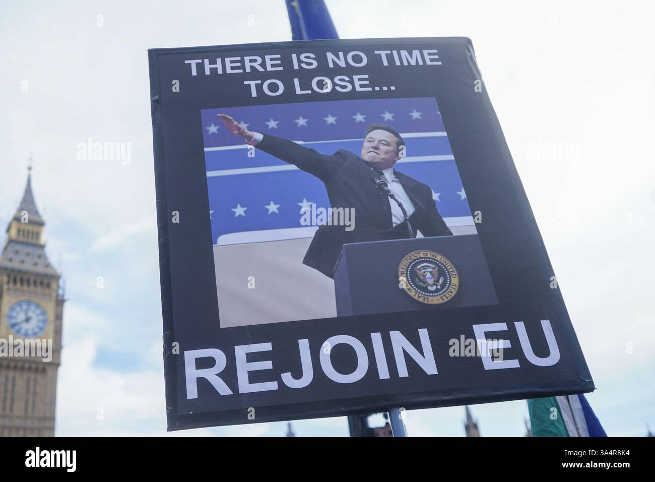 London, UK 19 March 2025. A protester holds a sign in Whitehall with a ...