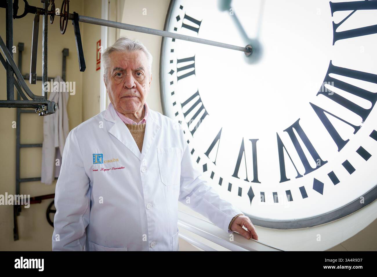 Watchmaker Jesús López-Terradas works on the disassembly of the Puerta ...