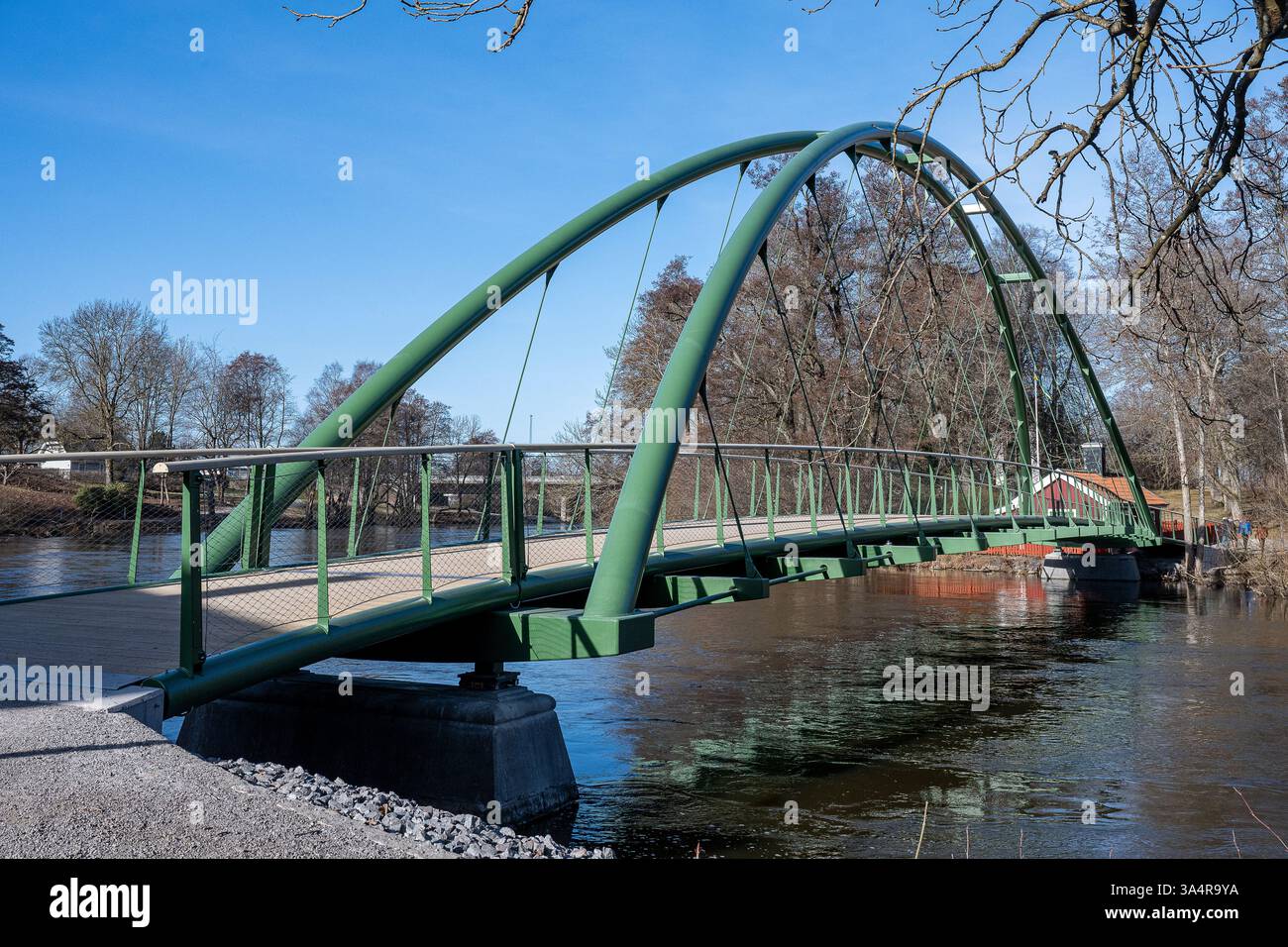 The New Five-Penny bridge at waterfront park Åbackarna across Motala ...