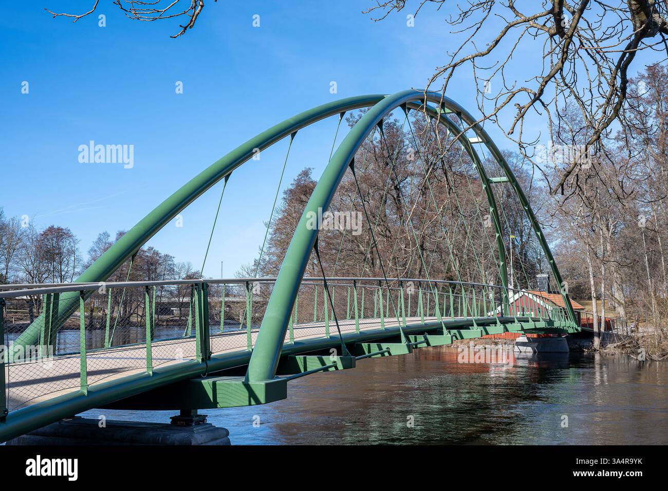The New Five-Penny bridge at waterfront park Åbackarna across Motala ...