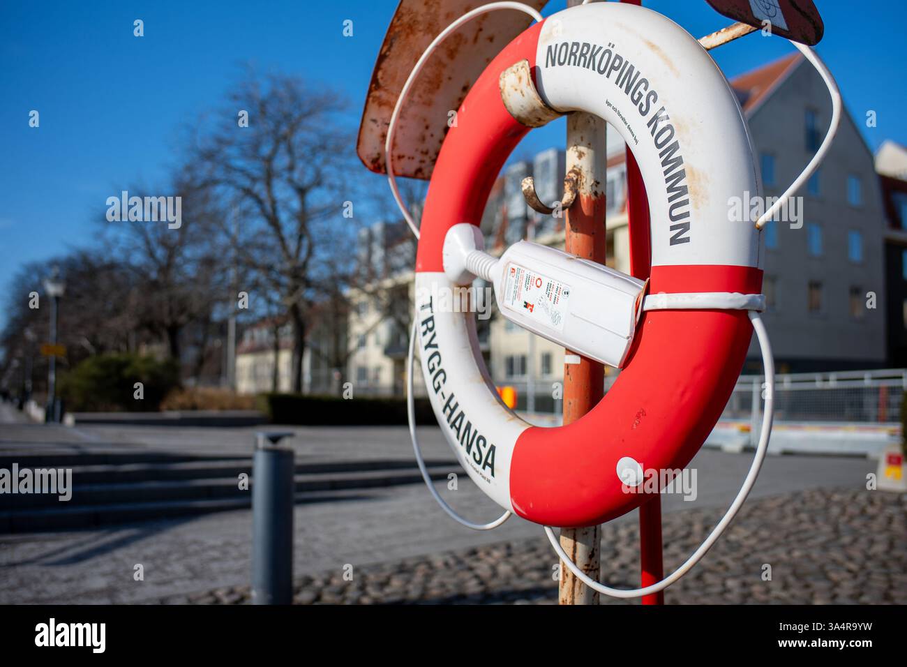 Lifebuoy at Norrköping waterfront Saltängen on an early spring day in ...