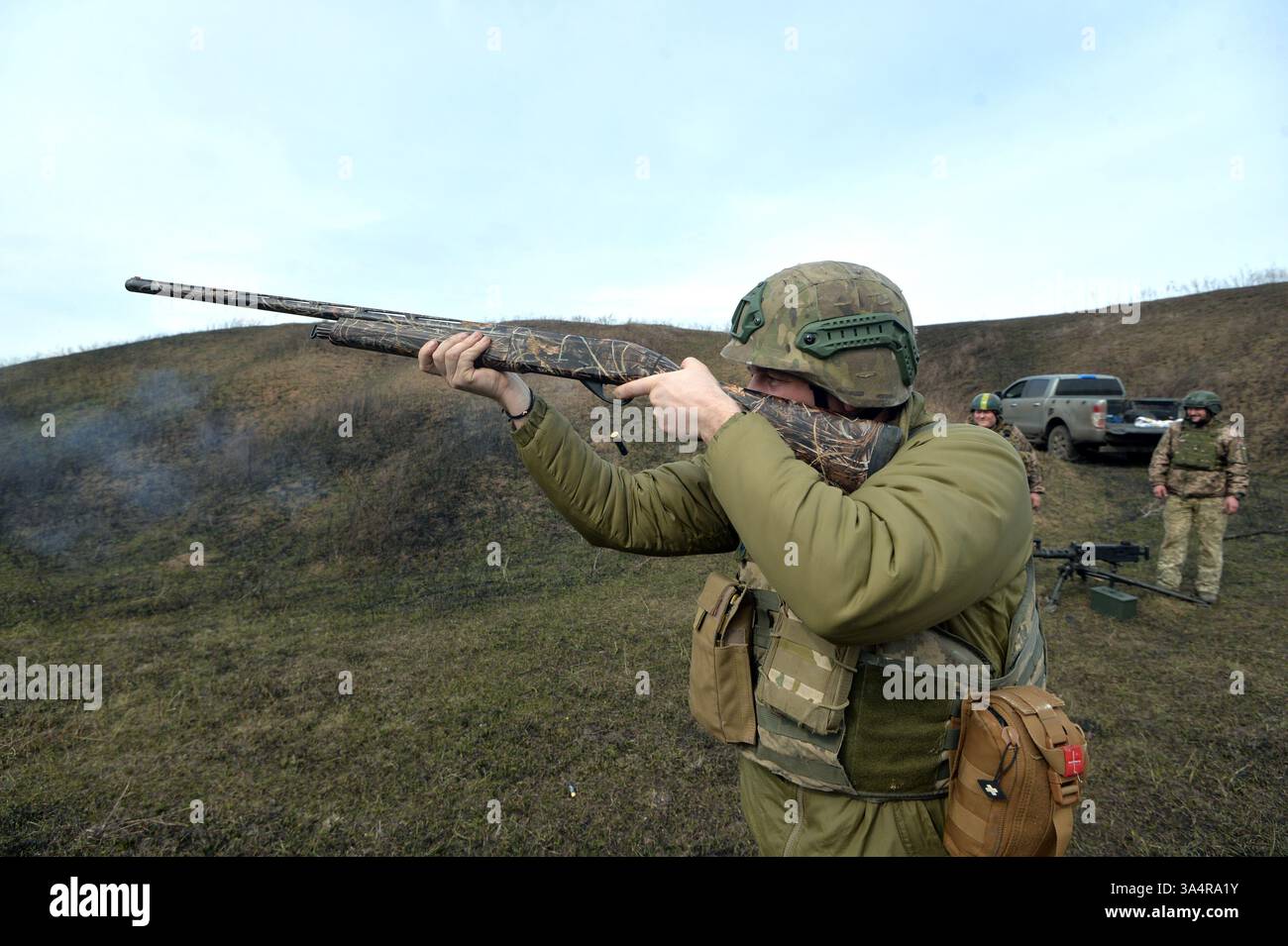 A machine gunner of the 2nd Rifle Battalion of the 57th Separate ...