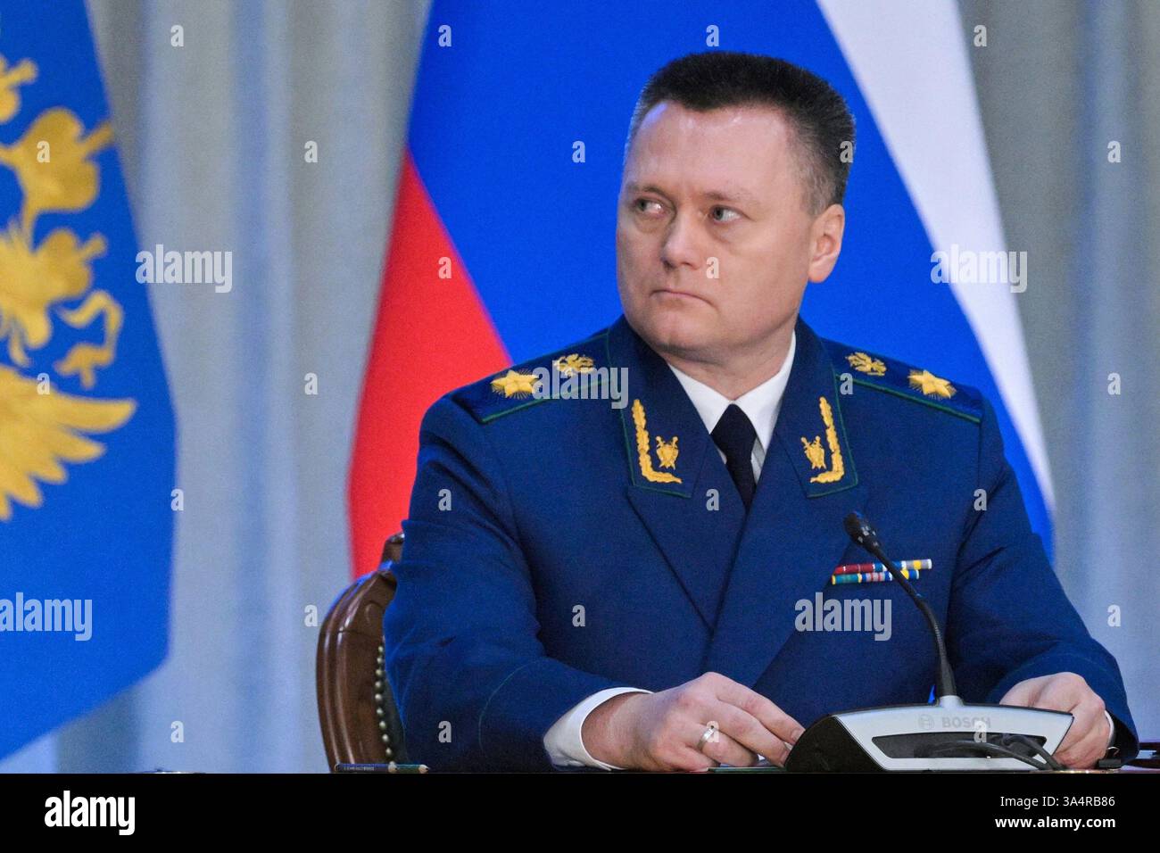 Russian Prosecutor General Igor Krasnov listens as Russian President ...