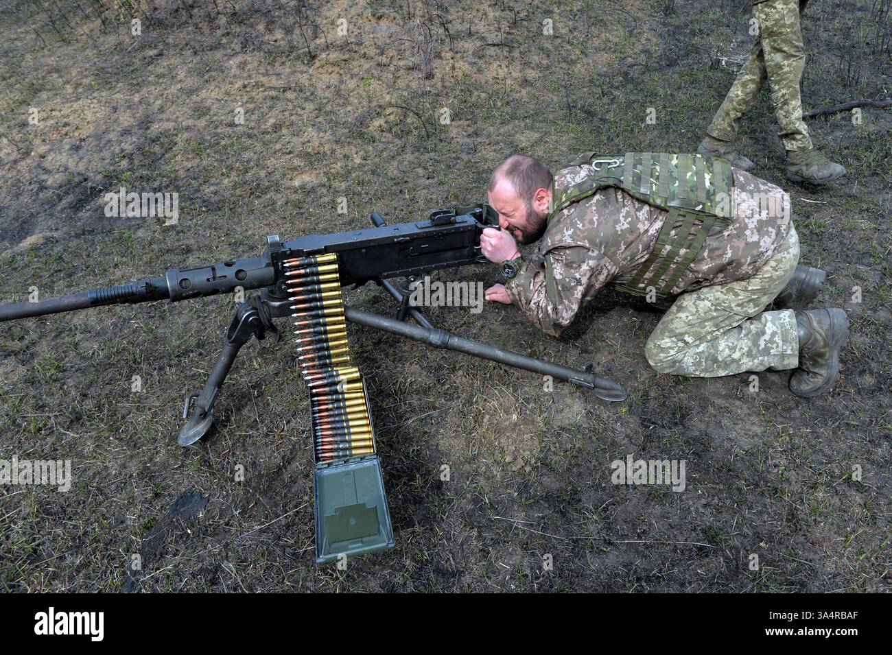 A machine gunner of the 2nd Rifle Battalion of the 57th Separate ...