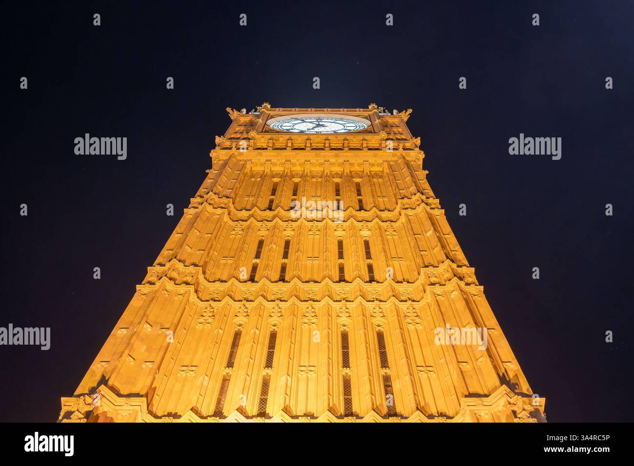 Big Ben stands tall against the night sky in London, England. The ...