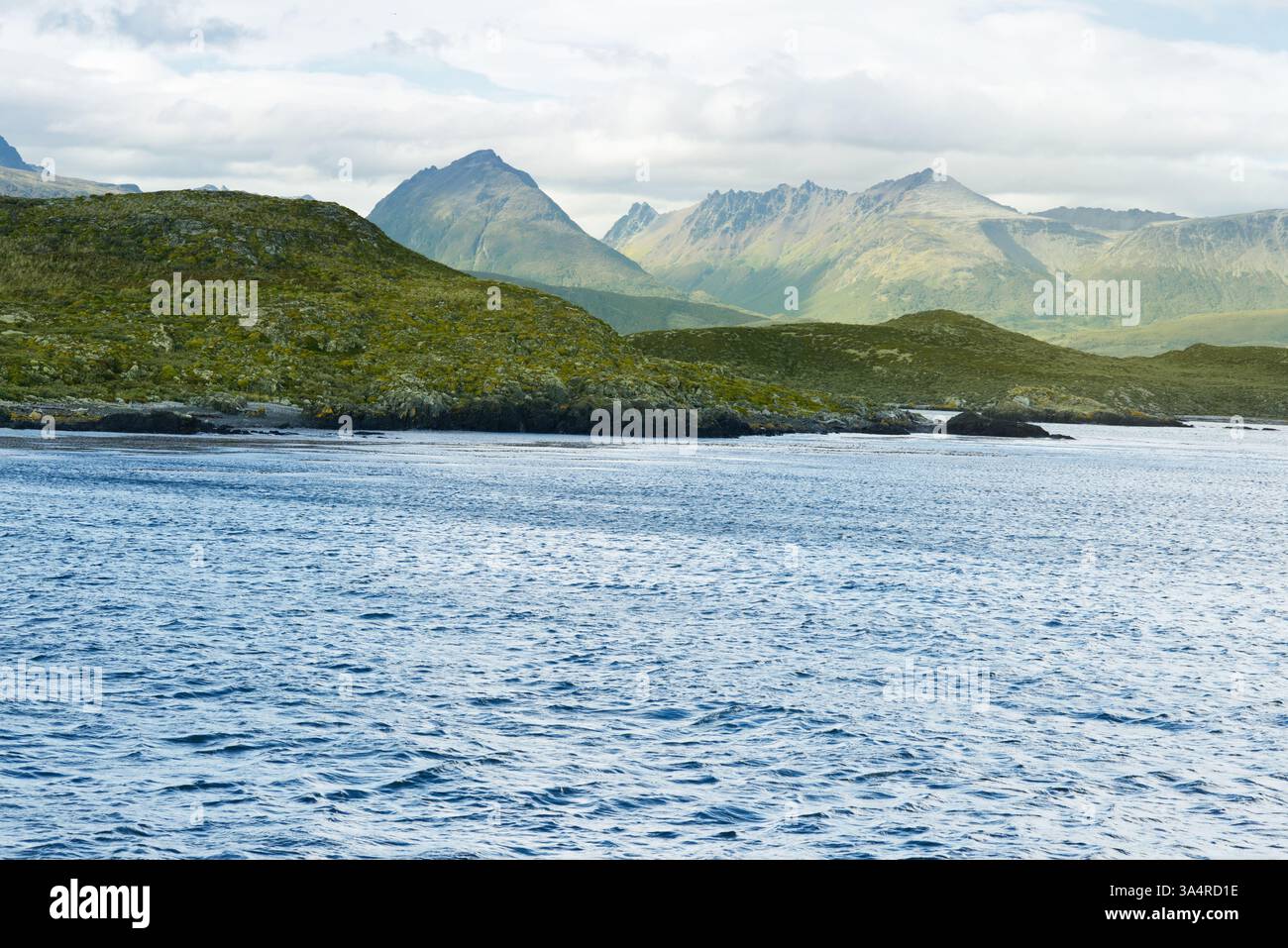 A tranquil view of the Beagle Channel in Patagonia, featuring calm ...